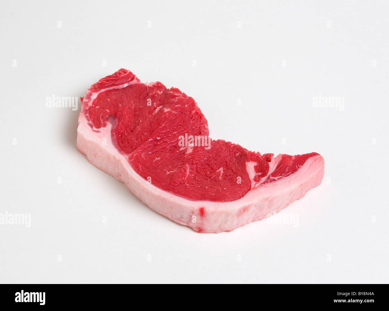Food Red Meat Beef Slice of raw uncooked sirloin steak on a white ...