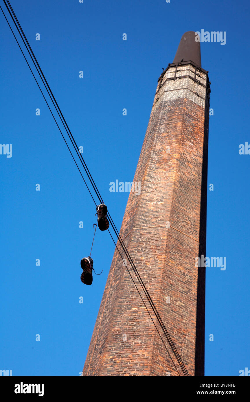 Trainers hanging electricity wire hi-res stock photography and images ...