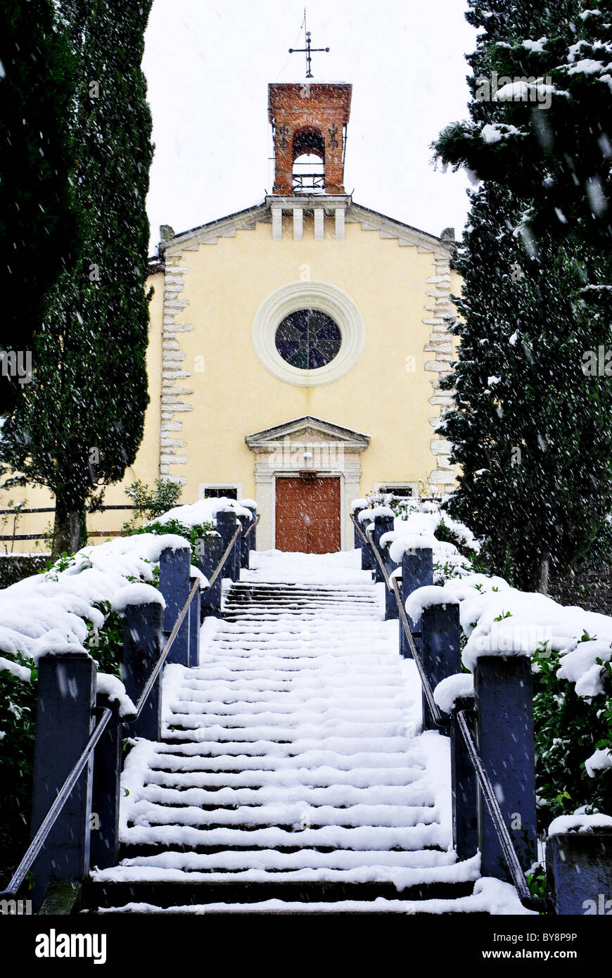 Catholic church, covered with snow and ice Stock Photo - Alamy