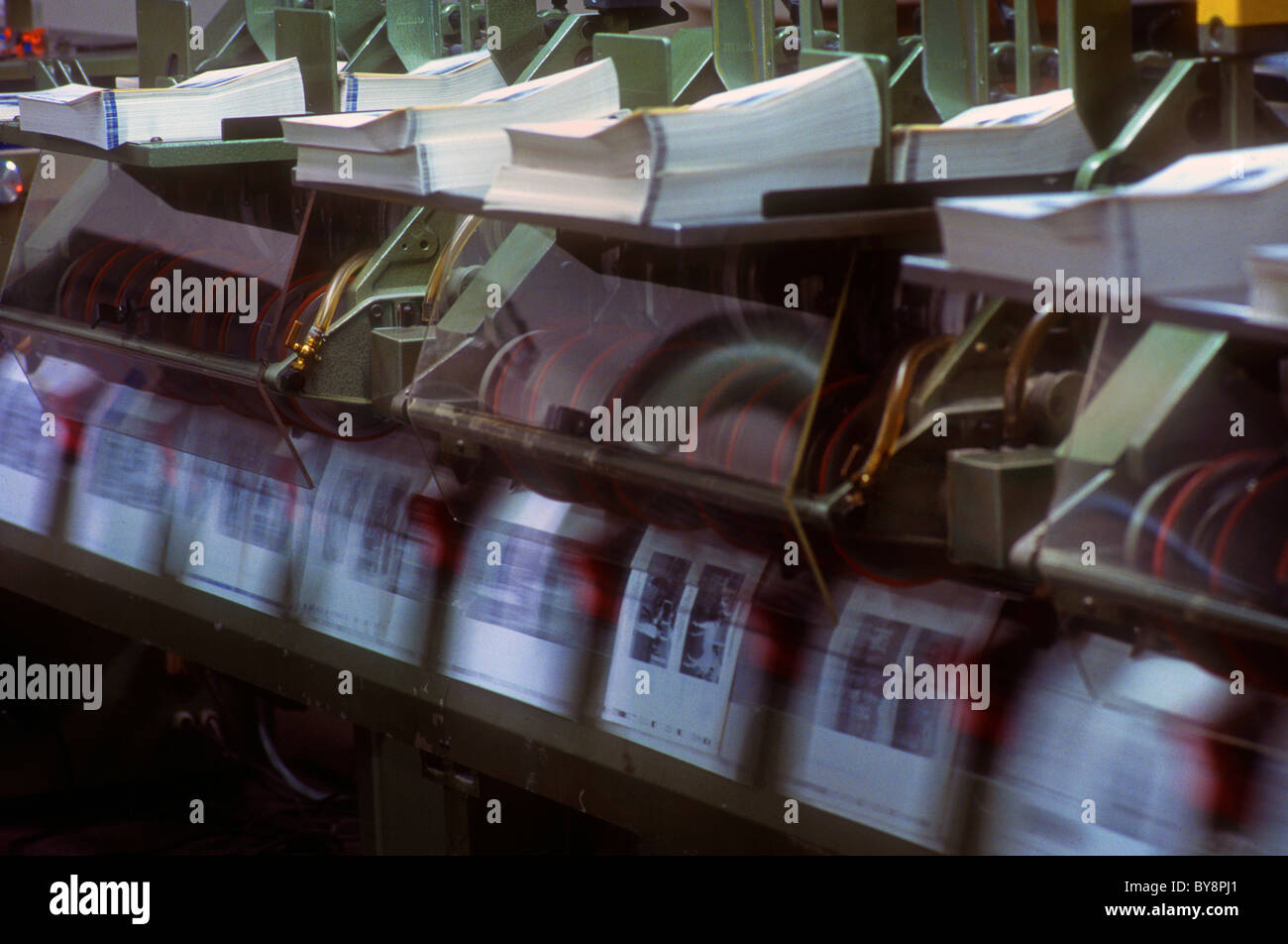 Printing press in motion Stock Photo - Alamy