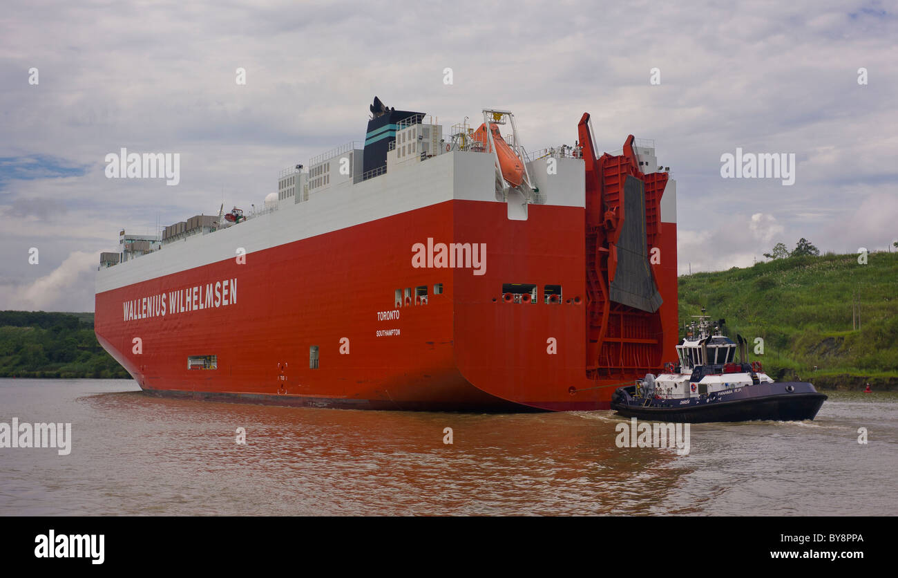 PANAMA - Wallenius Wilhelmsen car carrier and tugboat on Panama Canal ...