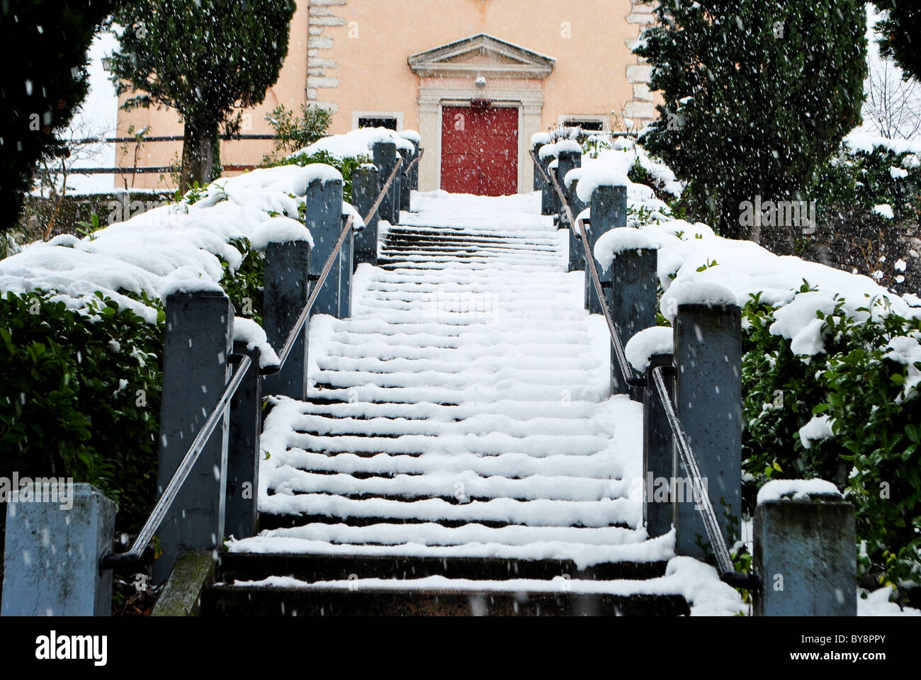 Catholic church, covered with snow and ice Stock Photo - Alamy