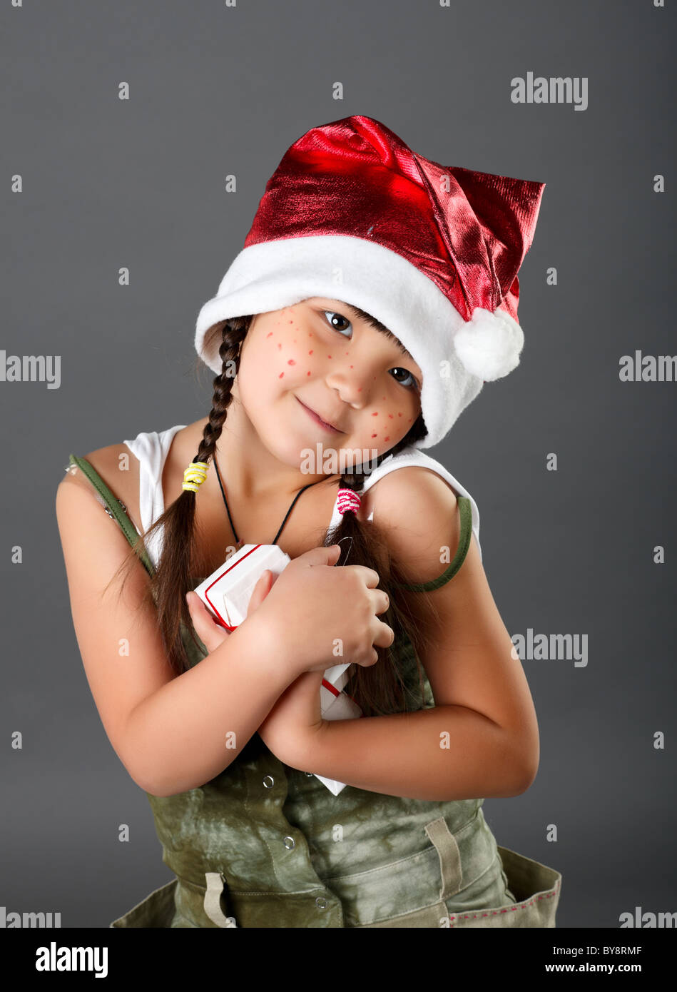 Little fashion model posing in studio Stock Photo - Alamy