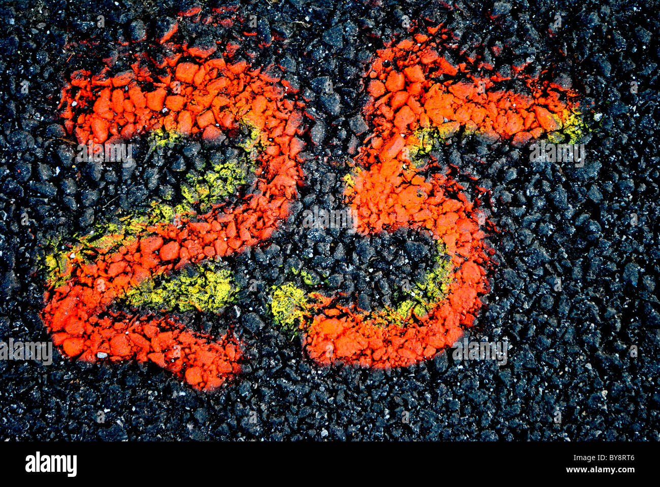 red numbers sprayed on asphalt Stock Photo - Alamy