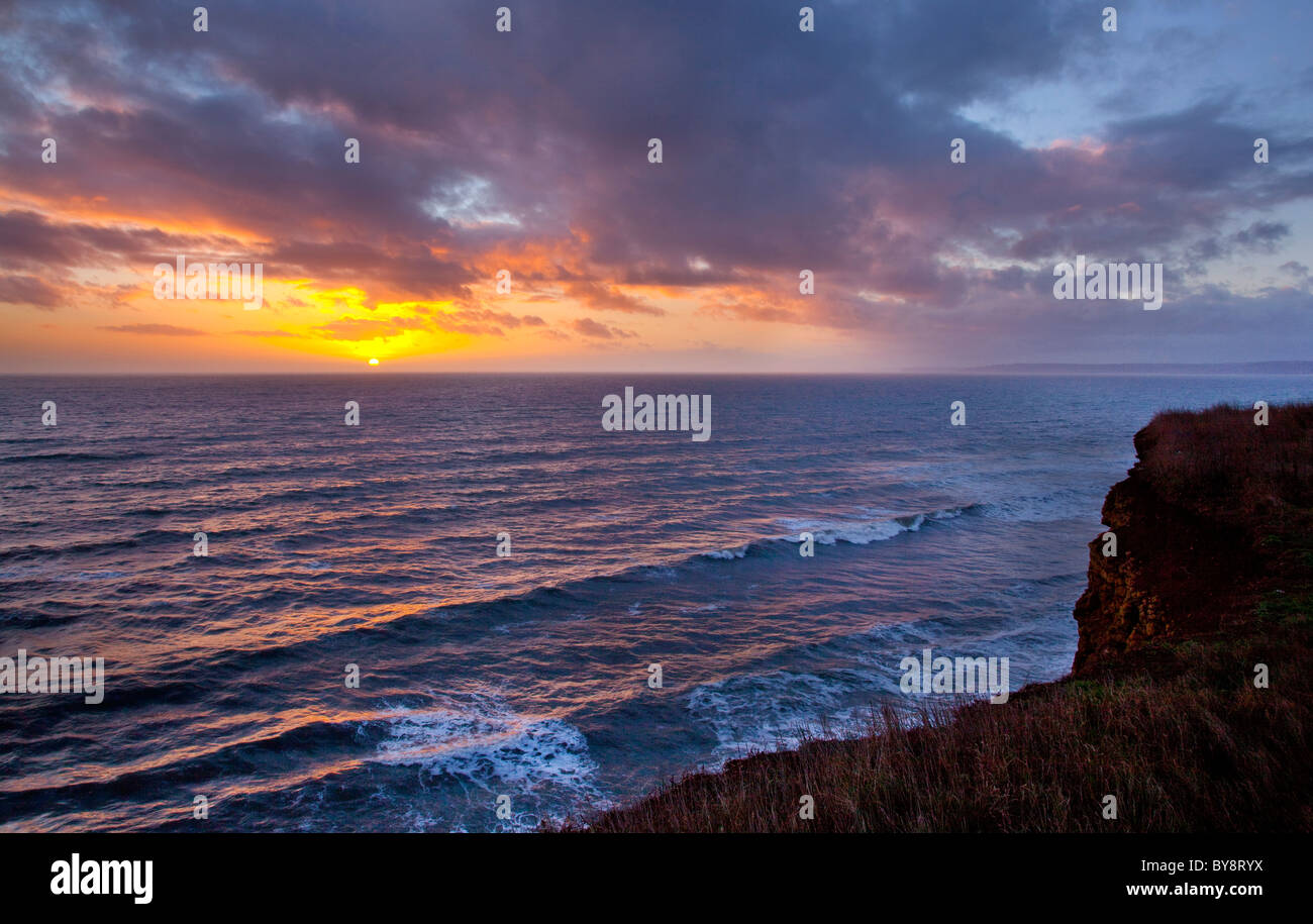 Sunset over Jurassic cliff formation at Burton Bradstock, on the Dorset ...