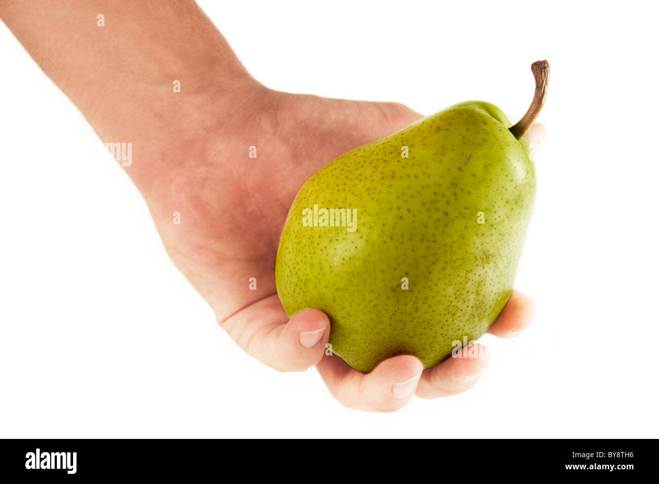 hand with green pear isolated on white background Stock Photo - Alamy