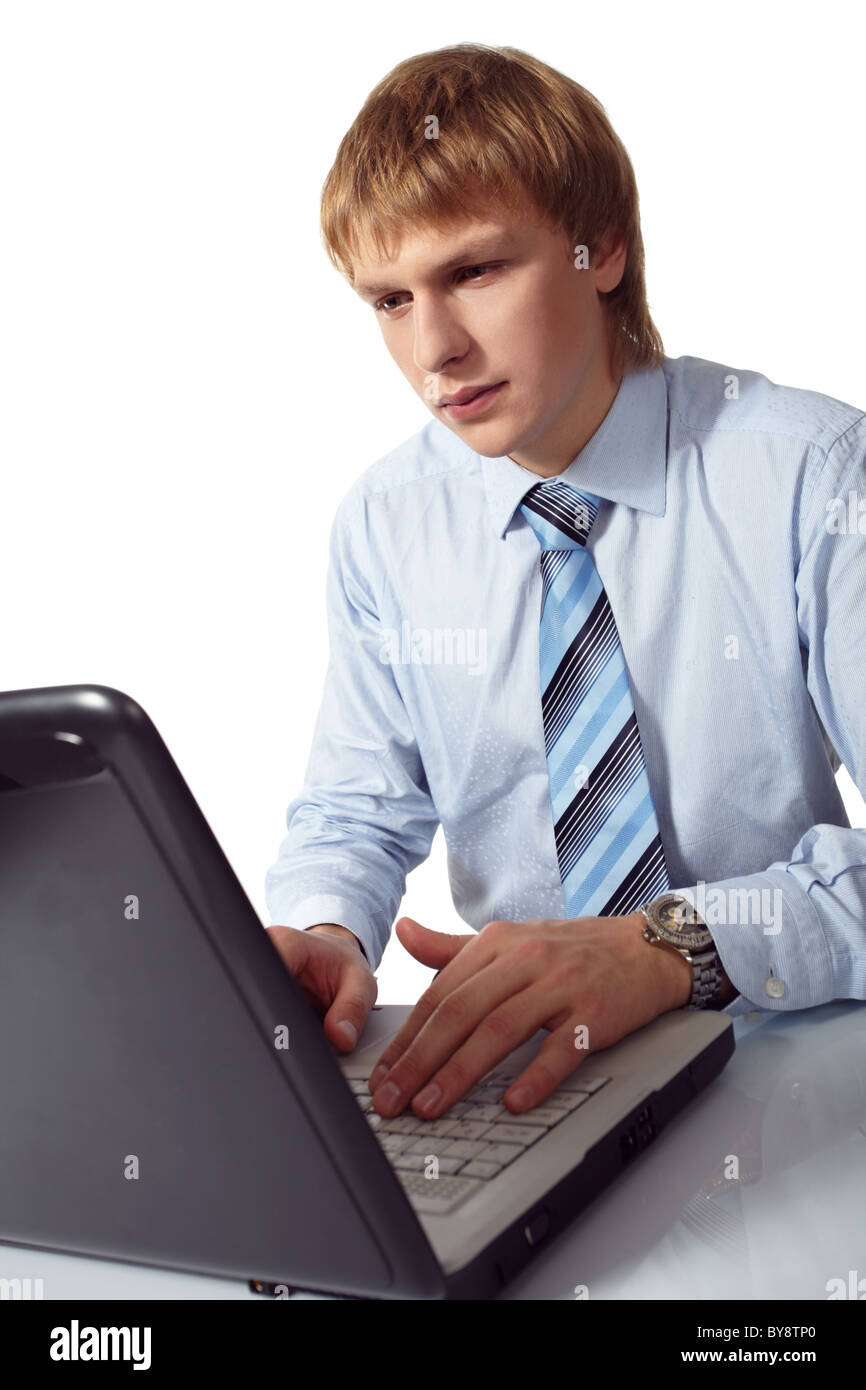 Young man with laptop Stock Photo - Alamy
