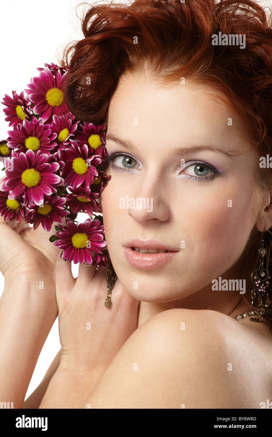 Portrait of a happy women with flowers Stock Photo - Alamy
