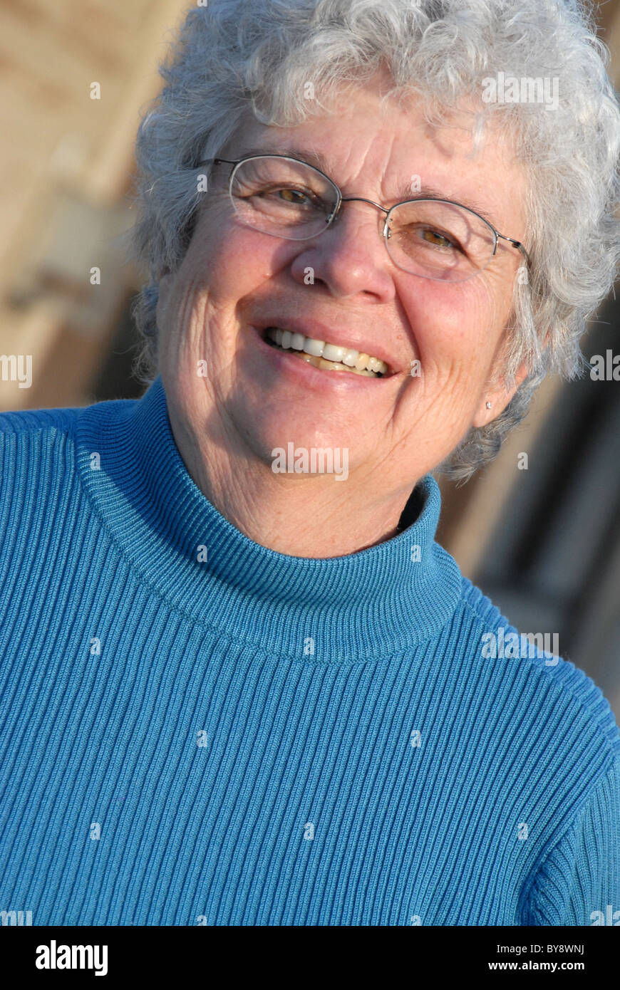 Senior woman smiling Stock Photo - Alamy