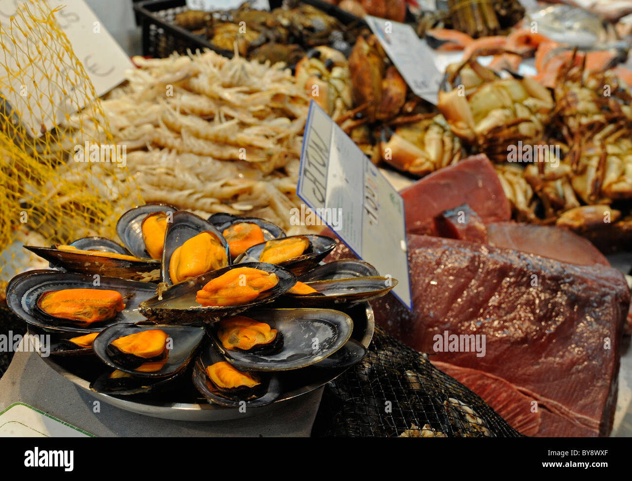 Mussels and other seafood are pictured at a fish booth on a fish market ...