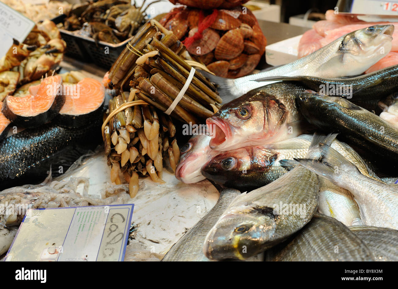 Fish and mussels are pictured at a fish booth on a fish market in Jerez ...