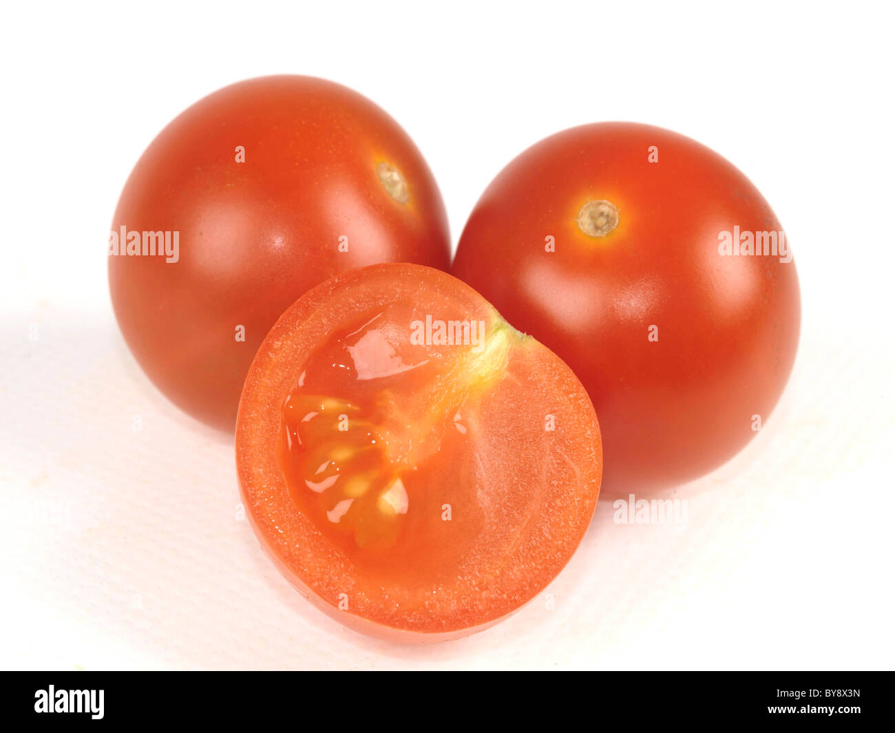 Cherry tomatoes fresh food raw uncooked half ingredients cut half hi ...