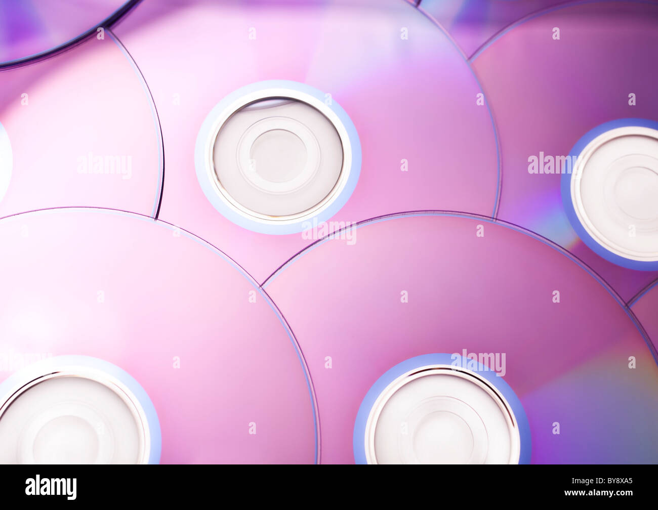 Background with violet cd close up Stock Photo - Alamy