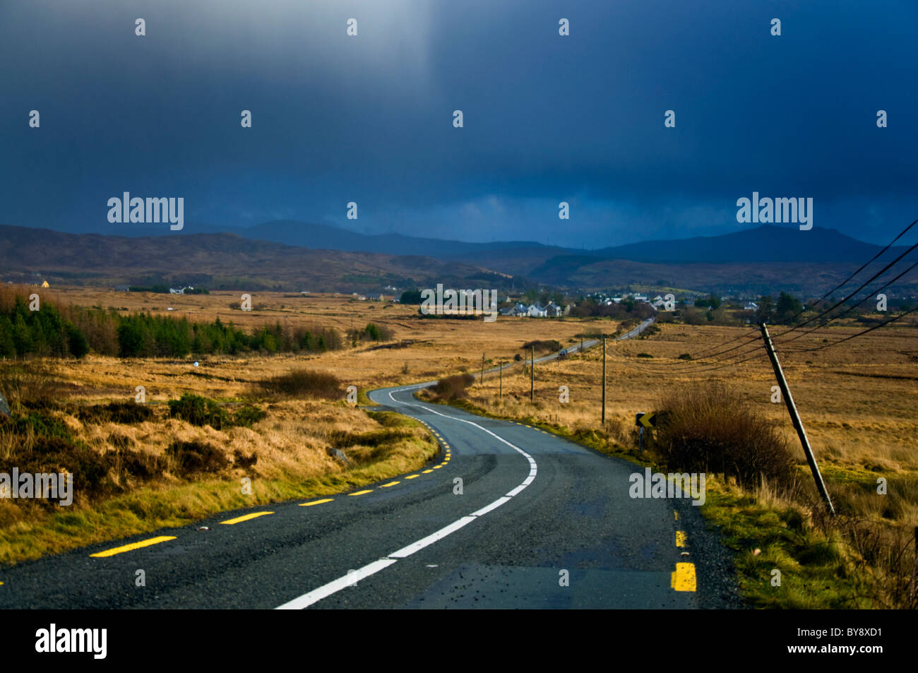 The N56 national road heading east into the Glen of Glenties as storm ...