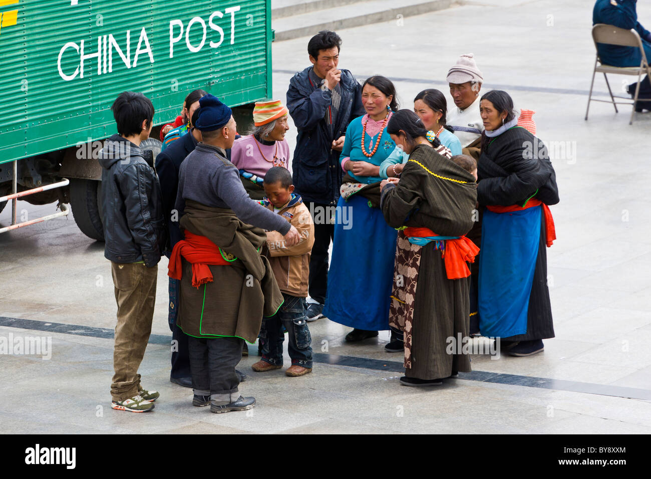 Tibetan family in Barkhor Square Lhasa Tibet. JMH4446 Stock Photo - Alamy