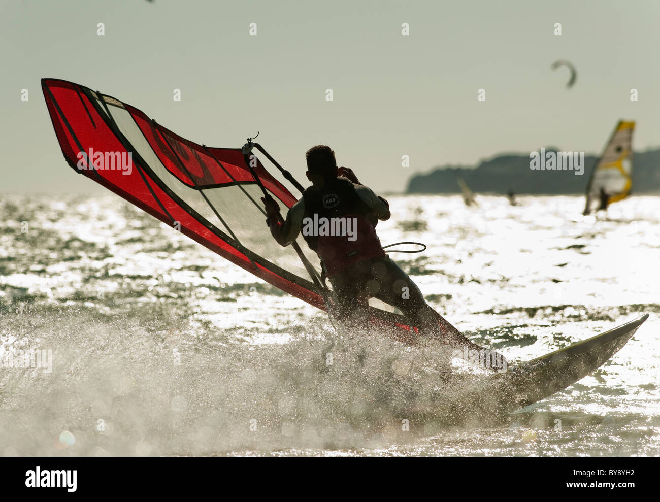 man duck gybing his sail Stock Photo - Alamy
