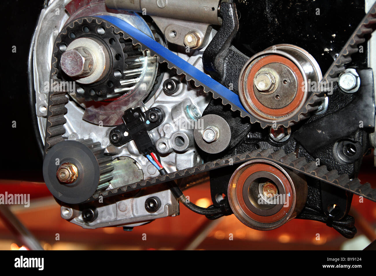 Cogs and reinforced rubber drive belt on modern high performance ...