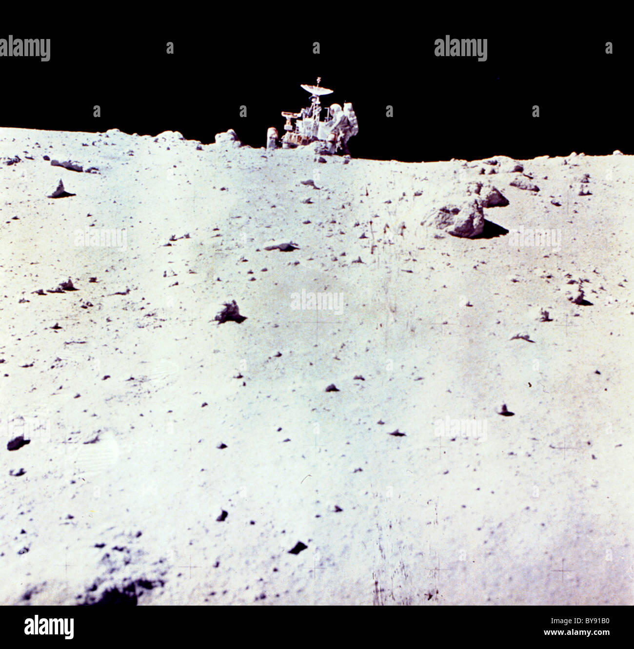 Astronaut Charles M. Duke, Jr. using the Lunar Roving Vehicle during ...