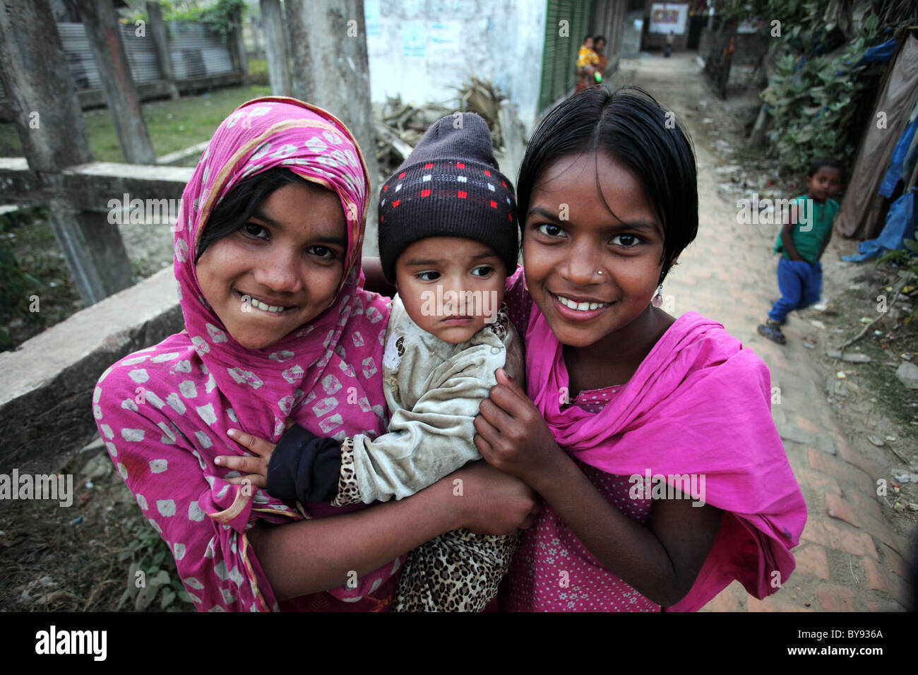 girls with kid in Bangladesh Asia Stock Photo - Alamy