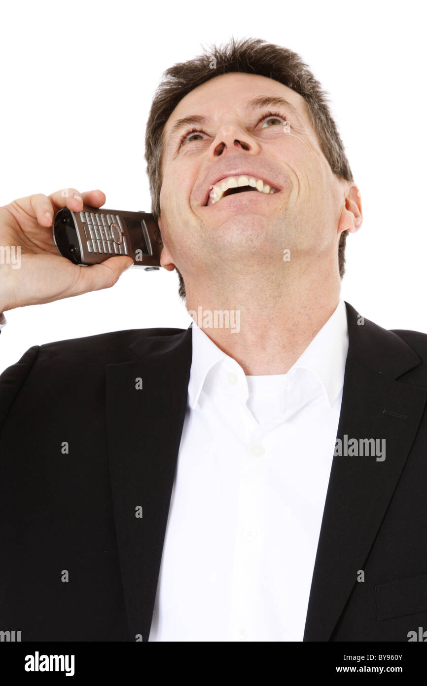 Attractive middle-aged man making a phone call. All on white background ...