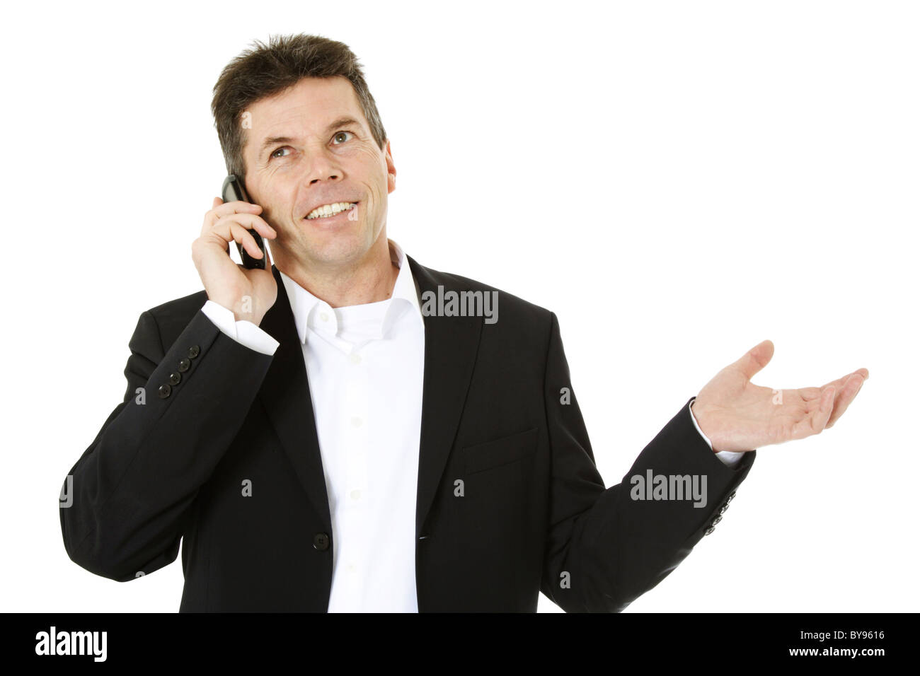 Attractive middle-aged man making a phone call. All on white background ...