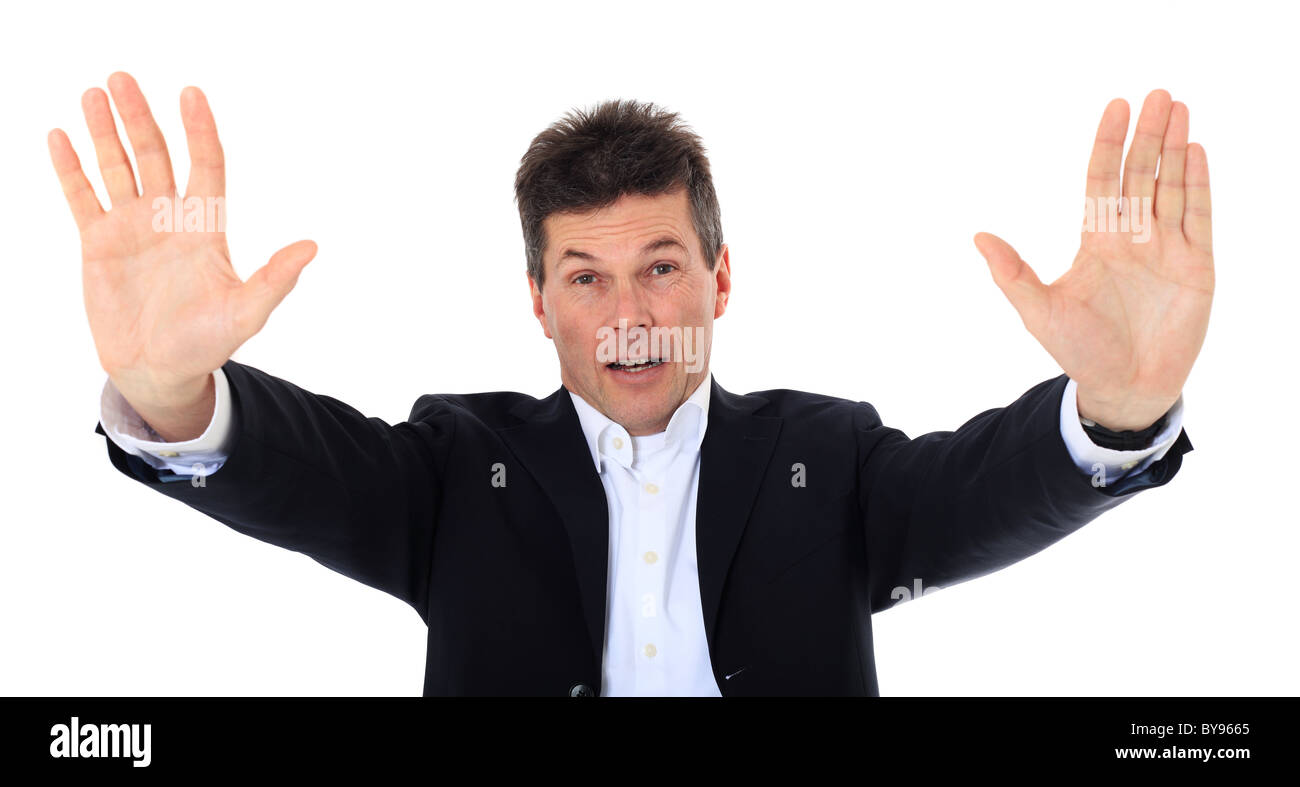 Attractive middle-aged man making repelling gesture. All on white ...