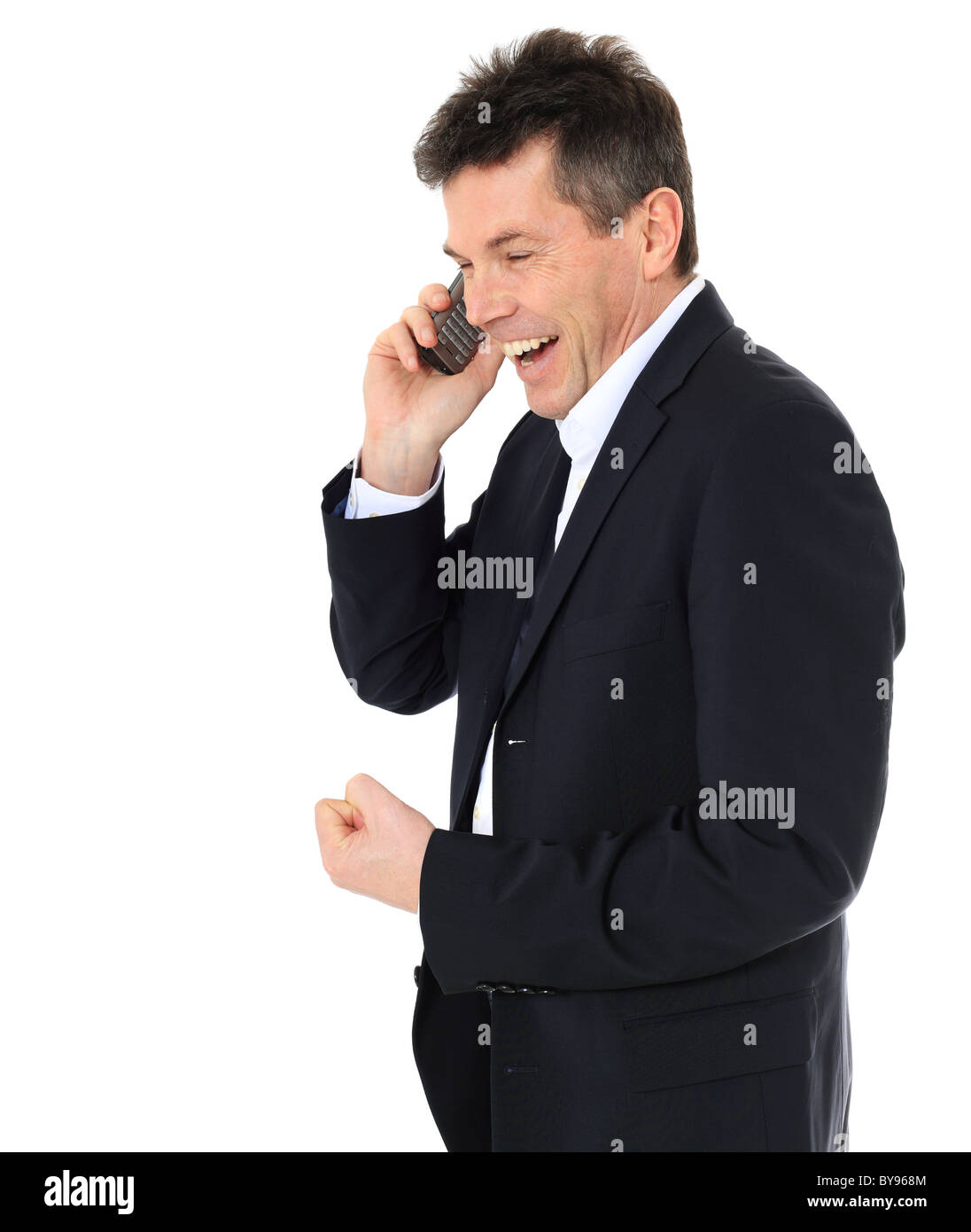Happy middle-aged man making a phone call. All on white background ...
