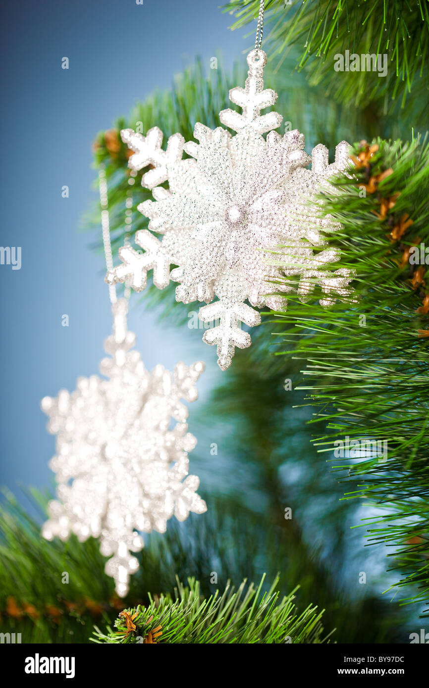 branch of Christmas tree with snowflake Stock Photo - Alamy