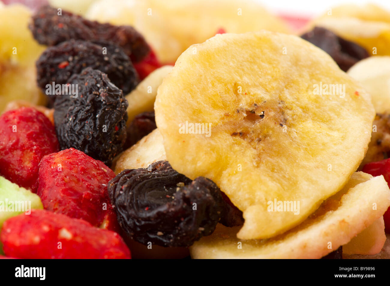 Various dried fruit isolated over white background Stock Photo - Alamy