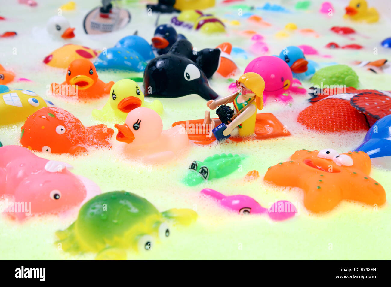 Bath toys, different colorful figures for kids to play with in a pool ...