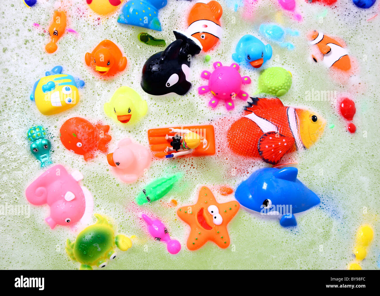 Bath toys, different colorful figures for kids to play with in a pool ...