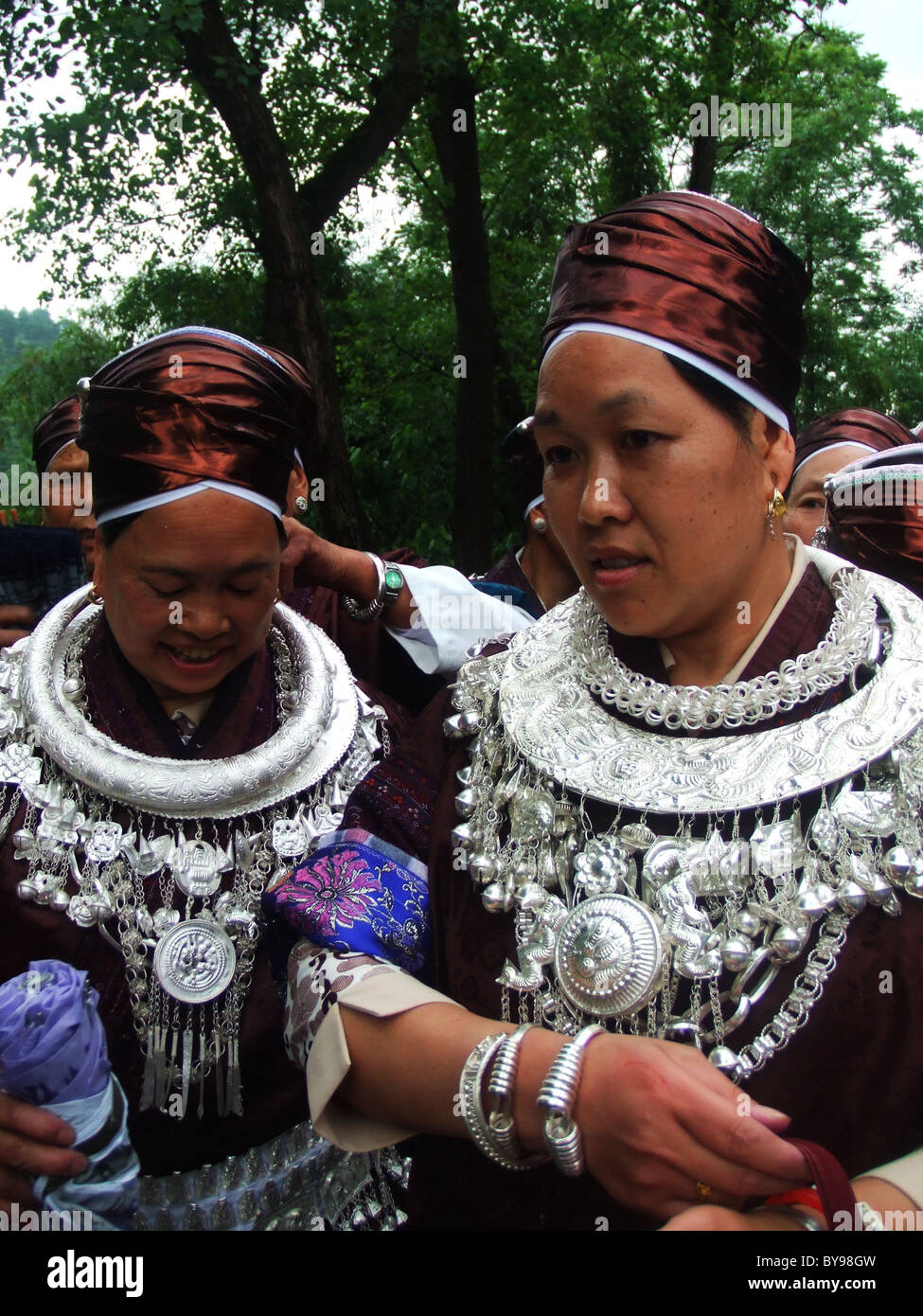 Colorful Miao women during an important annual festival in Huangping ...