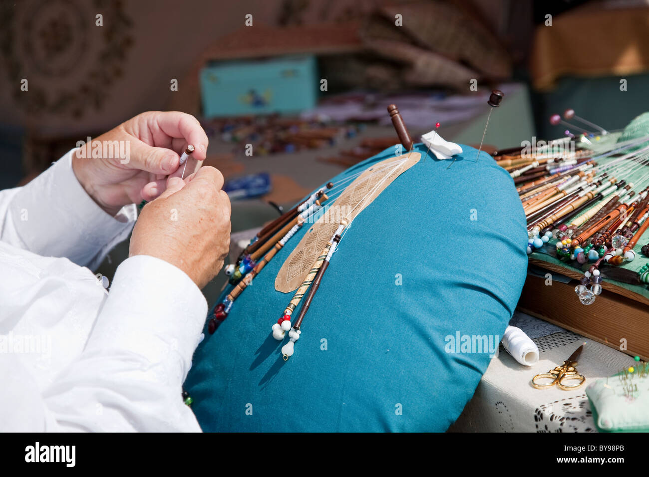 Torchon (bobbin) lace making at living history fayre Stock Photo - Alamy