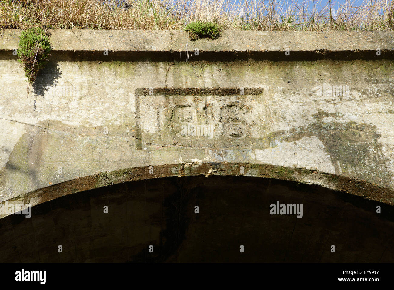 The Davington light railway tunnel in Kent with 1916 date Stock Photo ...