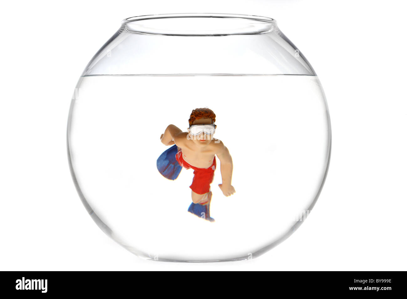 Diver, with mask and flippers, in a fish bowl Stock Photo - Alamy