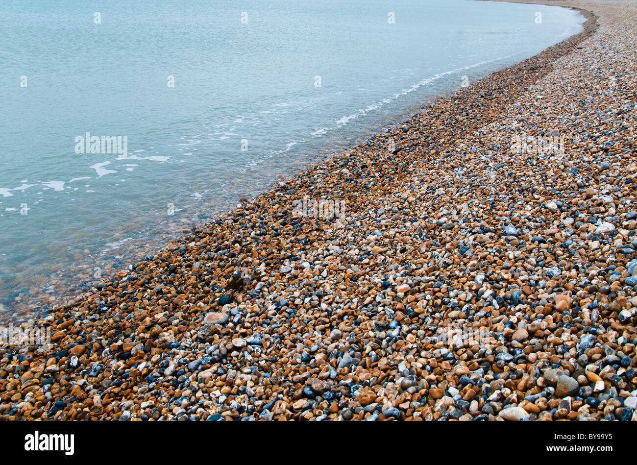 Seashore with pebbles Stock Photo - Alamy
