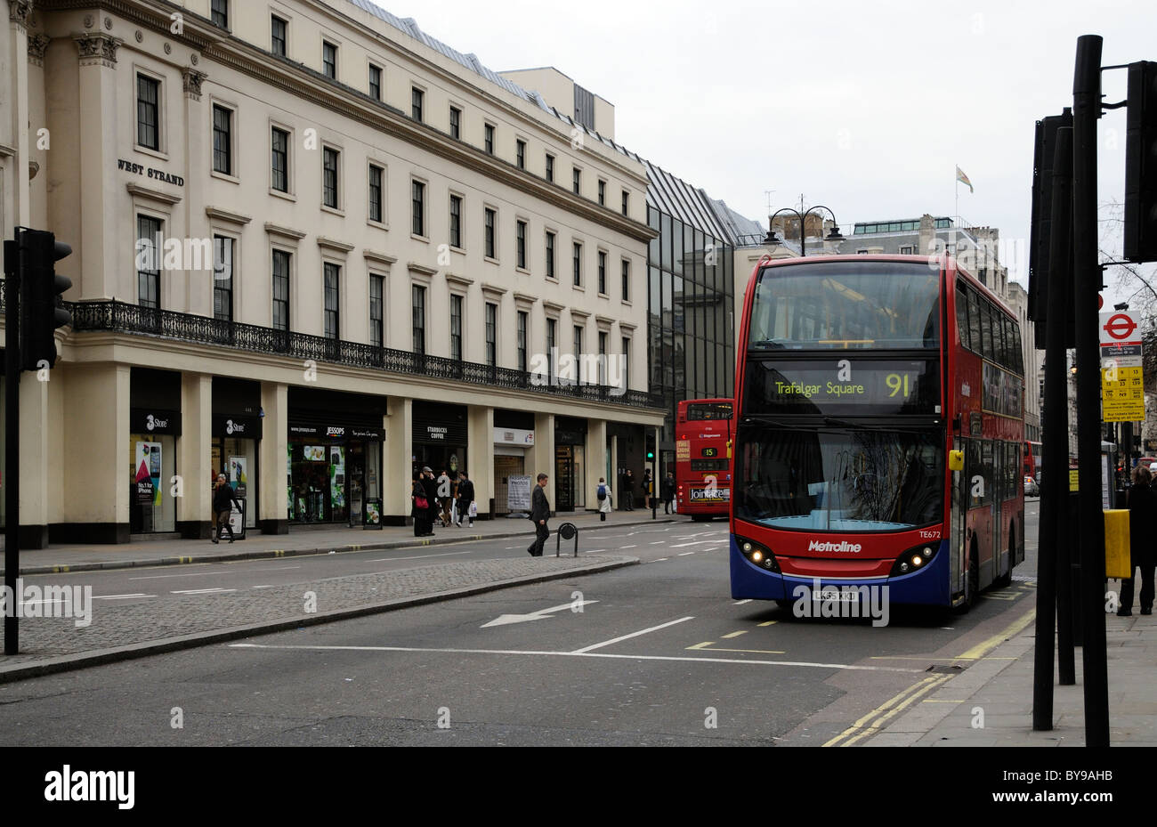 Red London Metroline bus on The Strand in central London England UK ...