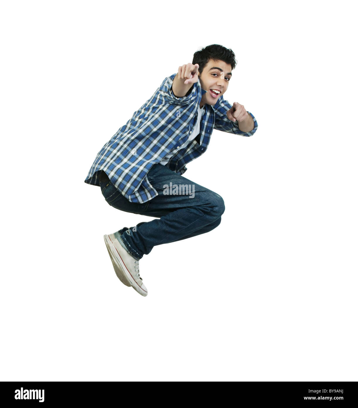 Man jumping pointing gesture hi-res stock photography and images - Alamy