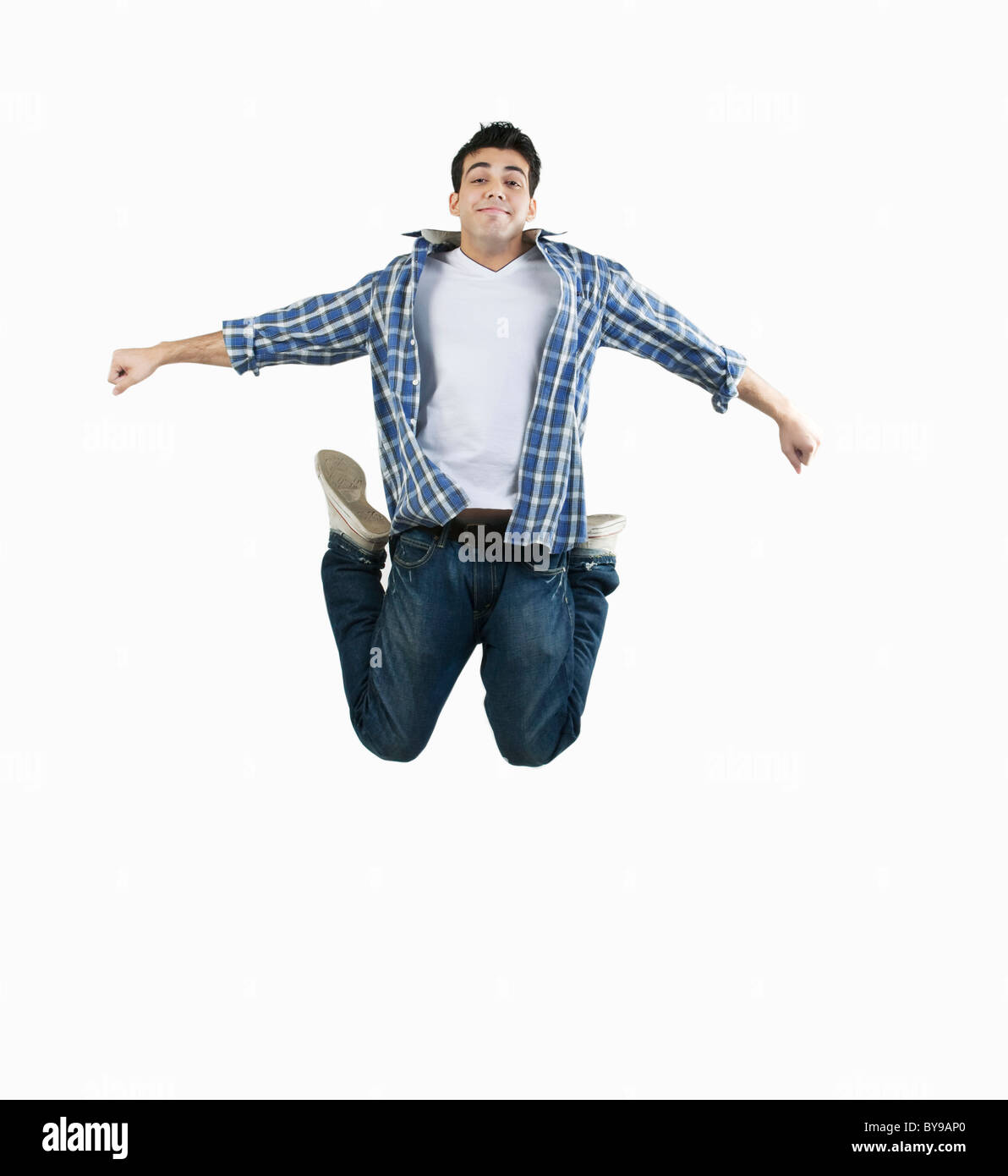 Man jumping in the air Stock Photo - Alamy