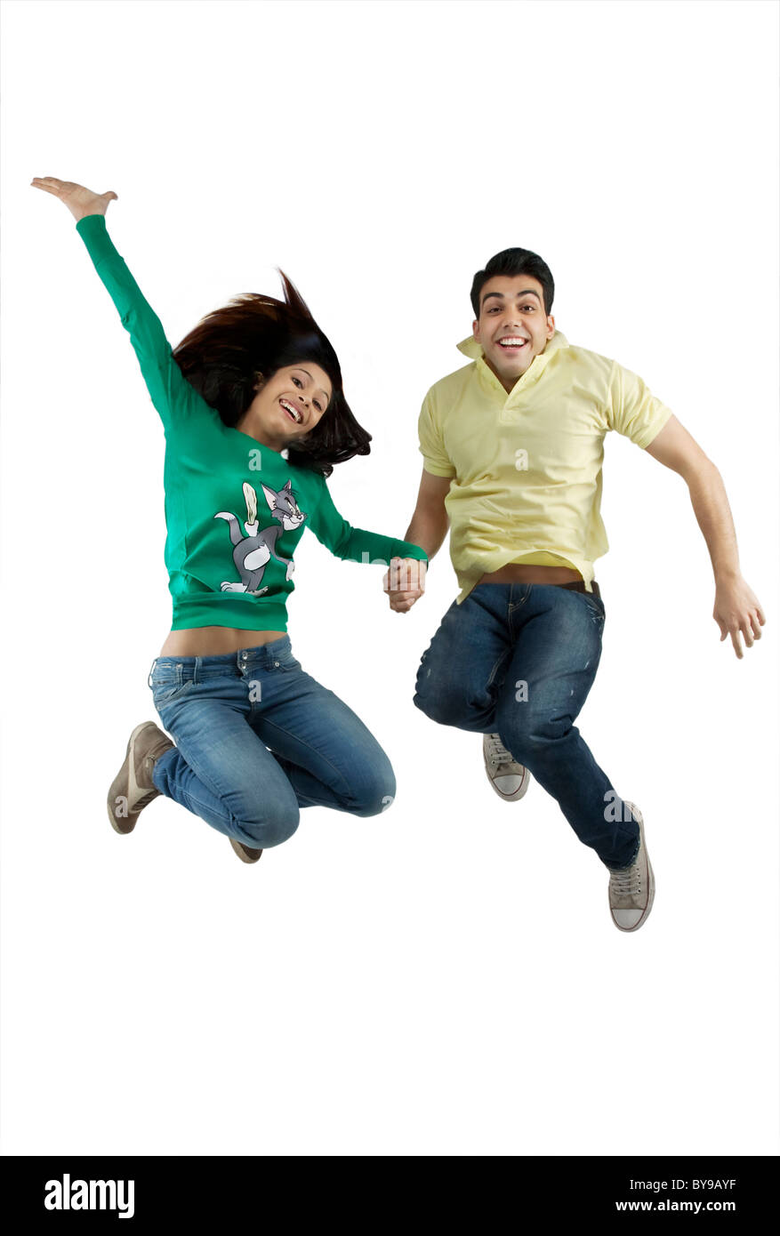 Boy two girls jumping in hi-res stock photography and images - Alamy