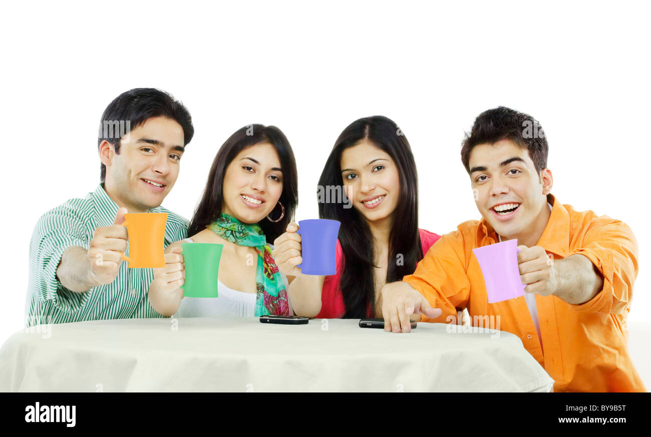 Friends enjoying a cup of tea Stock Photo - Alamy