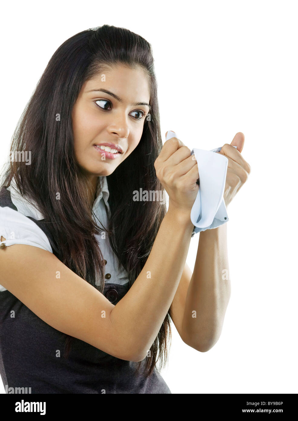Woman tearing a piece of paper Stock Photo - Alamy