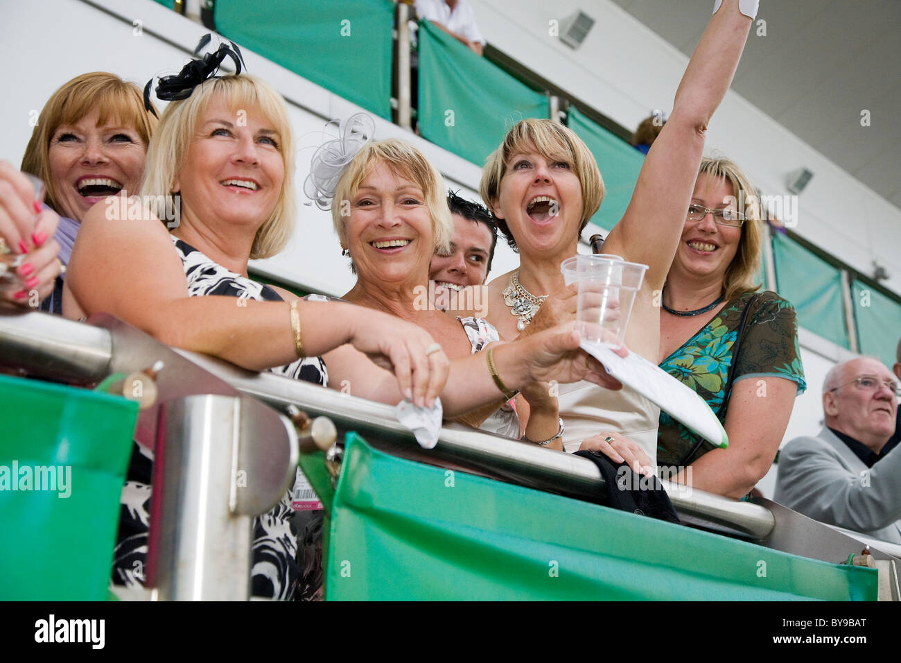 Cheering women at Great Yarmouth Races Ladies Day Stock Photo - Alamy