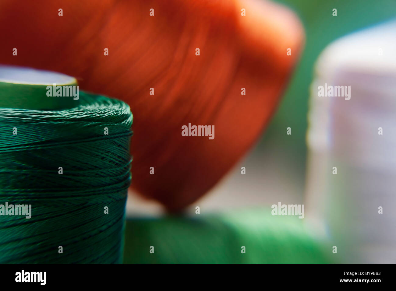 Different coloured spools Stock Photo - Alamy
