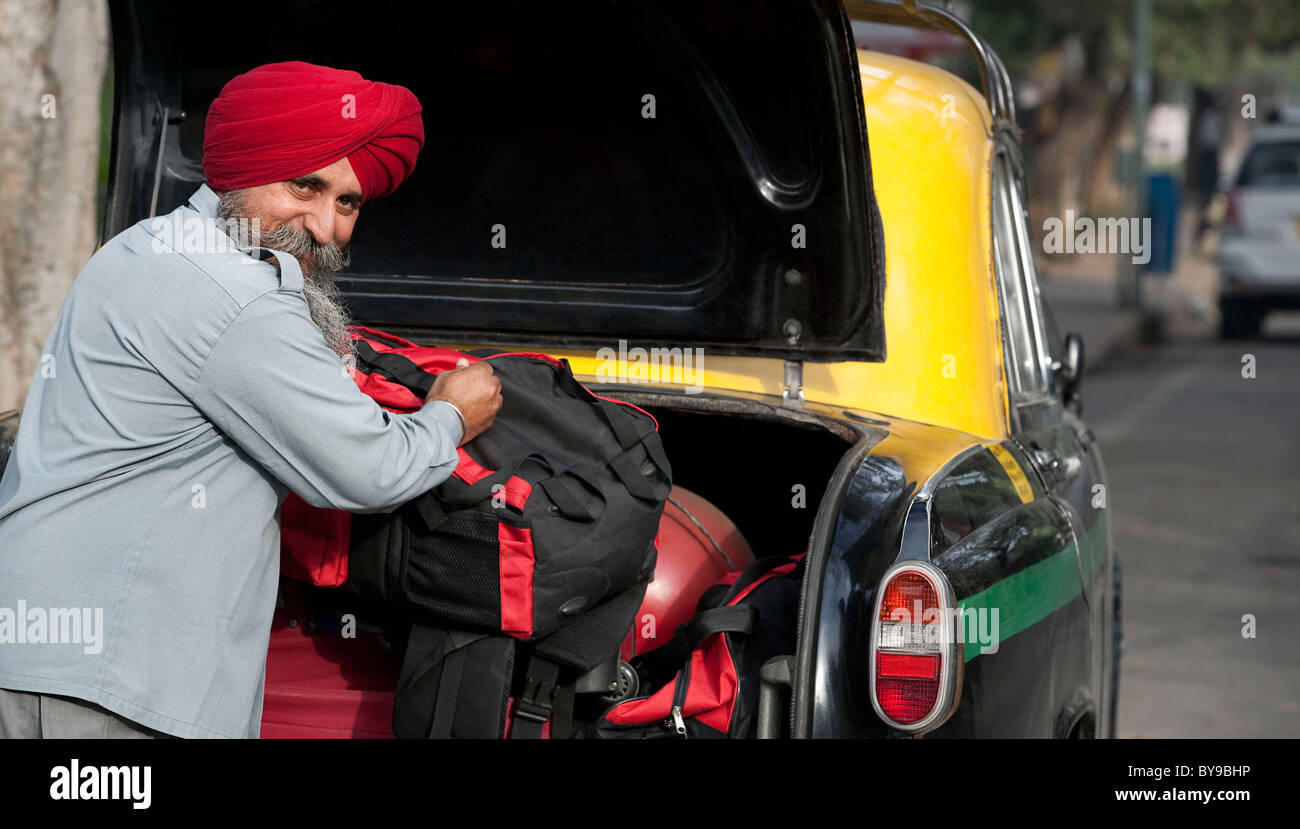 Sikh taxi driver luggage hi-res stock photography and images - Alamy