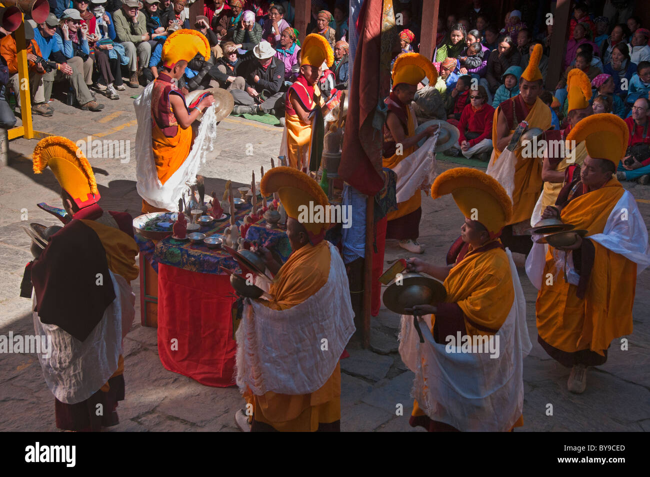 yellow hat monks dancing at the Mani Rimdu Festival at Tengboche ...