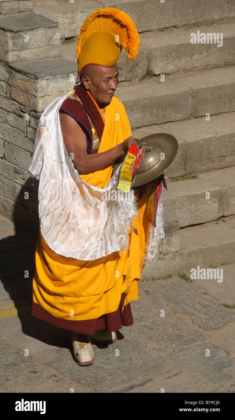 Buddhist yellow hat monks play hi-res stock photography and images - Alamy