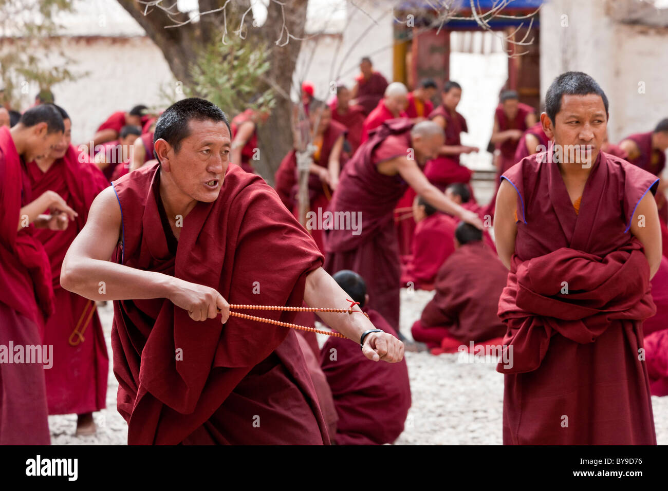 Monks debating in the Debating Courtyard at Sera Monastery Lhasa Tibet ...