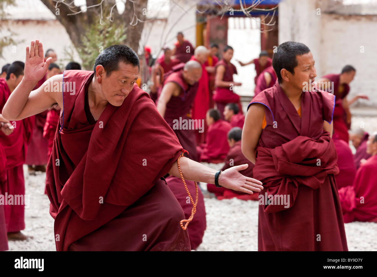 Monks debating in the Debating Courtyard at Sera Monastery Lhasa Tibet ...