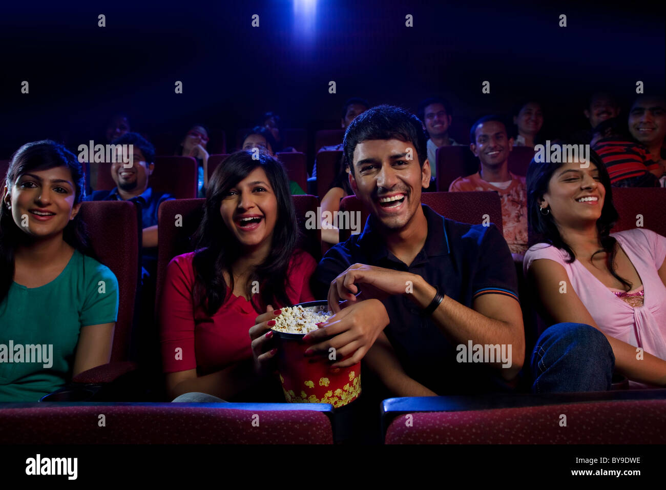 Indian couple cinema hall enjoy hi-res stock photography and images - Alamy